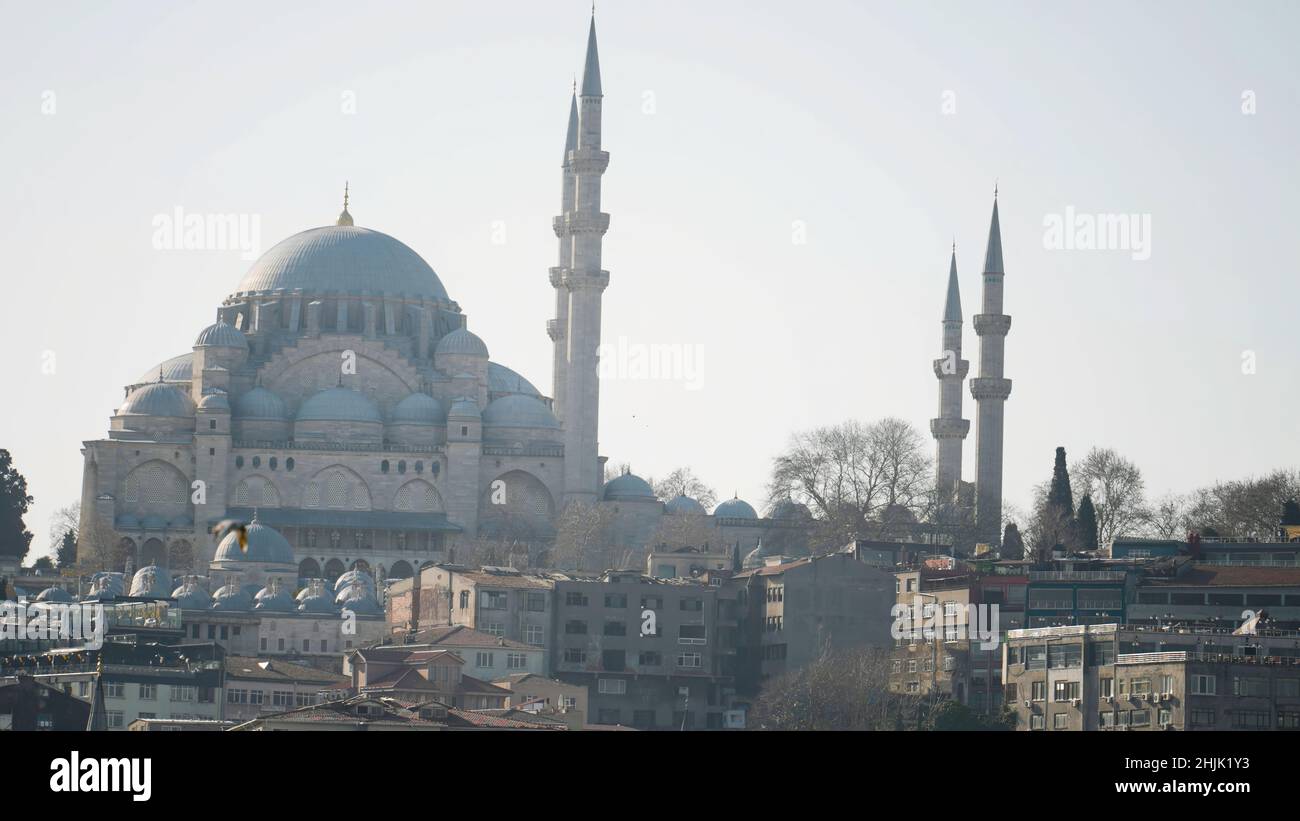 Beautiful mosque towers over city. Action. Great Mosque with its ...
