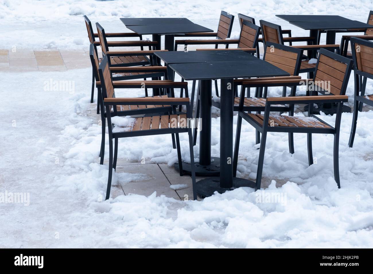 The interior of the restaurant. Empty dining tables background standing ...