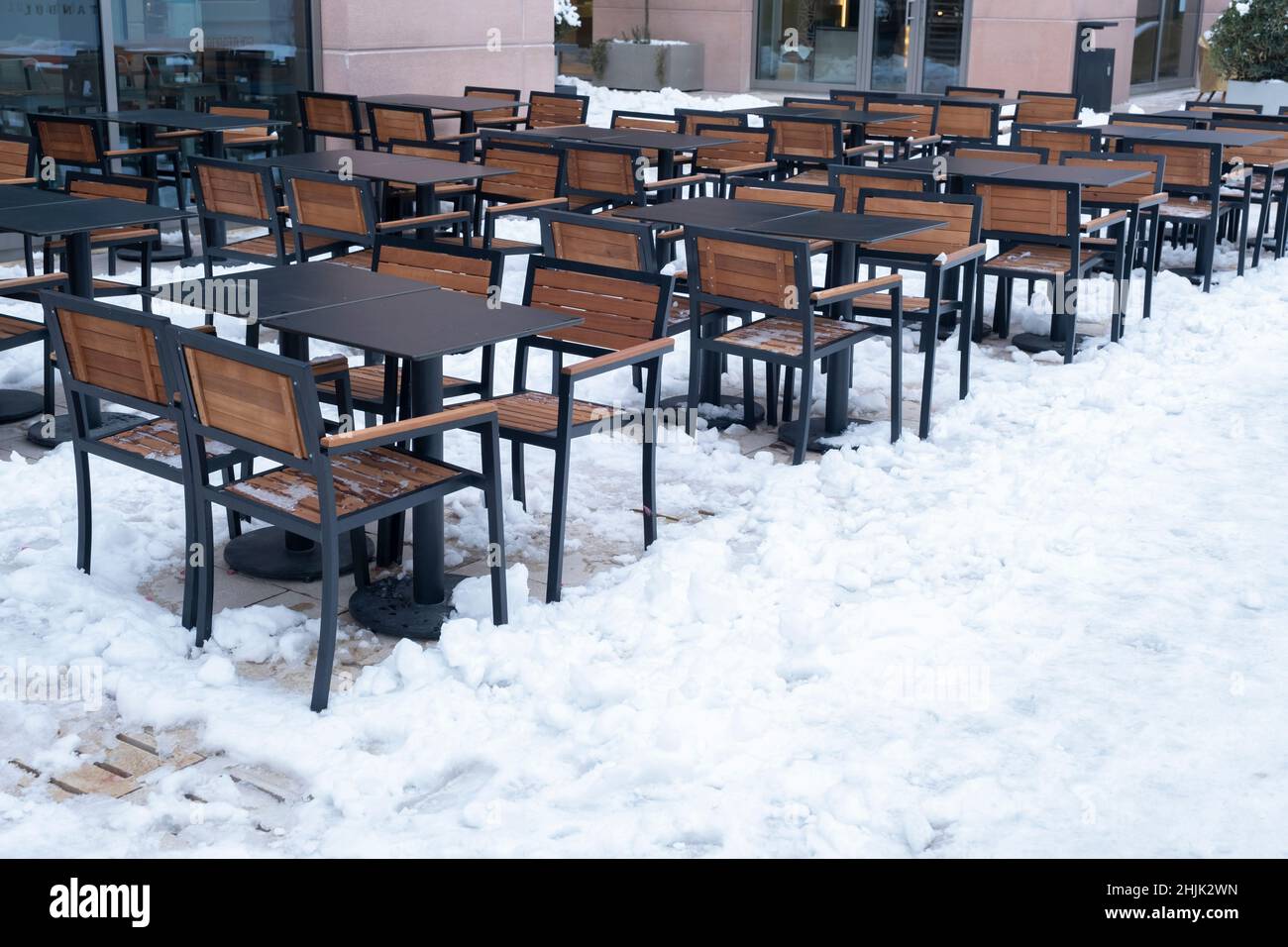The interior of the restaurant. Empty dining tables background standing ...