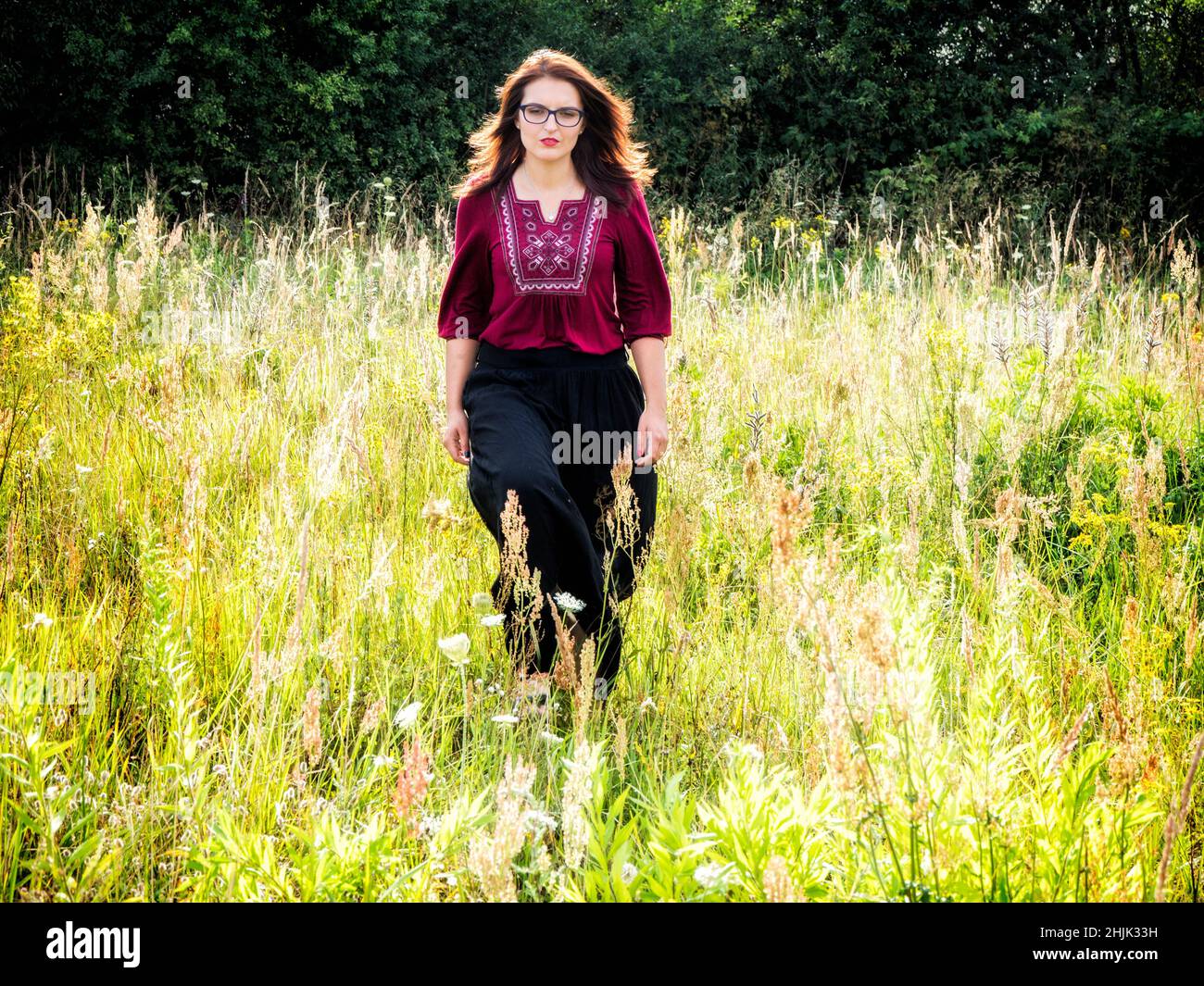 Walking through a wildflower meadow hi-res stock photography and images ...