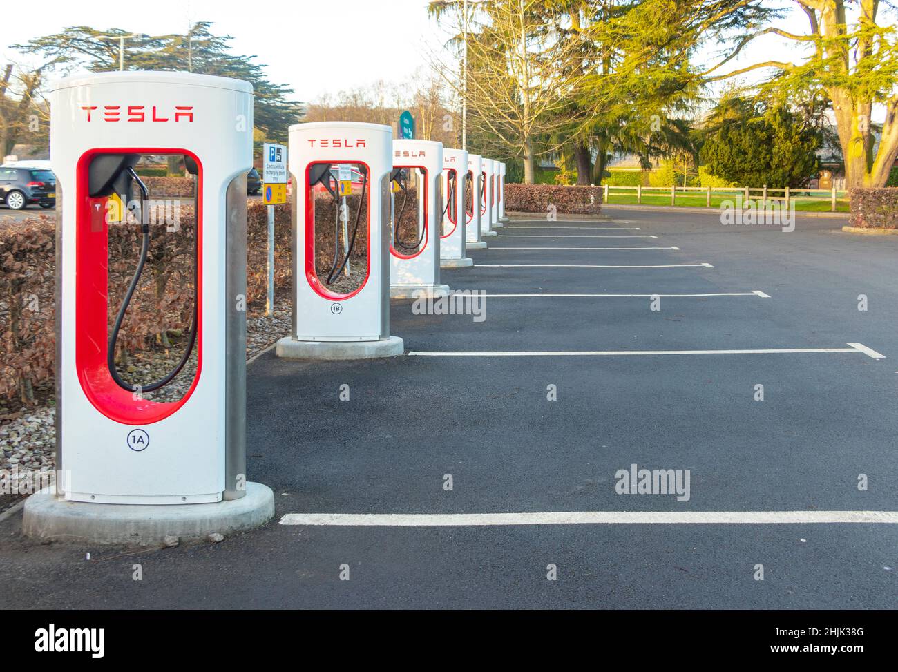 Row of Tesla Superchargers vehicle electric charging point at Trentham ...
