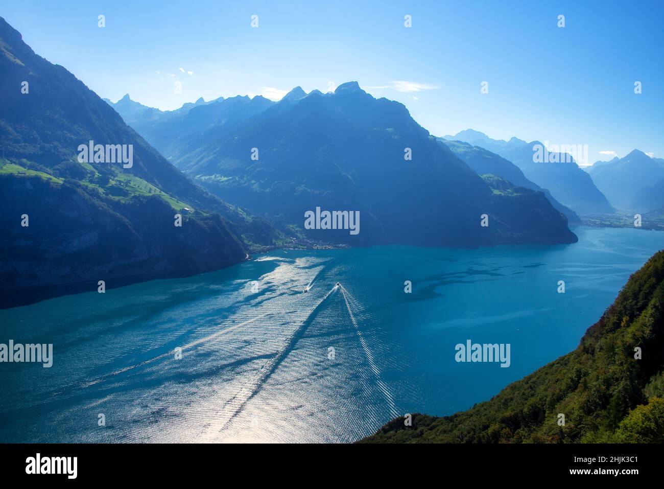 Distant aerial view of boat sailing on Lake Uri, Switzerland Stock ...
