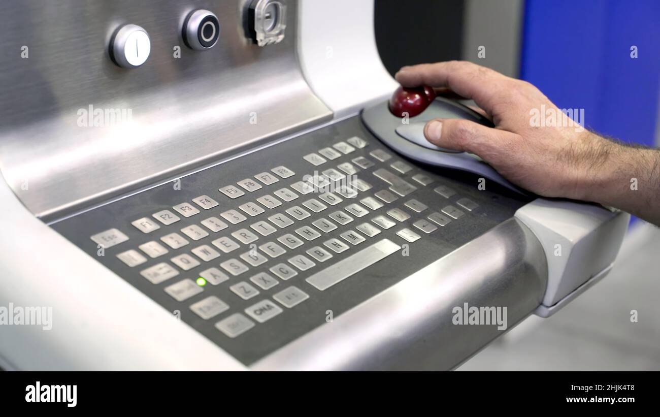 Close-up of man operating modern control panel. Scene. Modern control ...