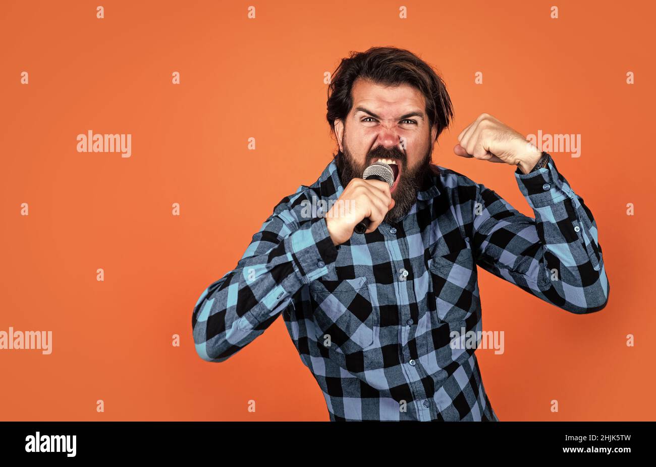 music concept. brutal handsome man with moustache. mature singer sing ...