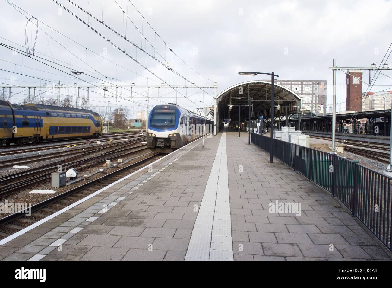 Train at a platform at station Nijmegen waits to transport passengers ...
