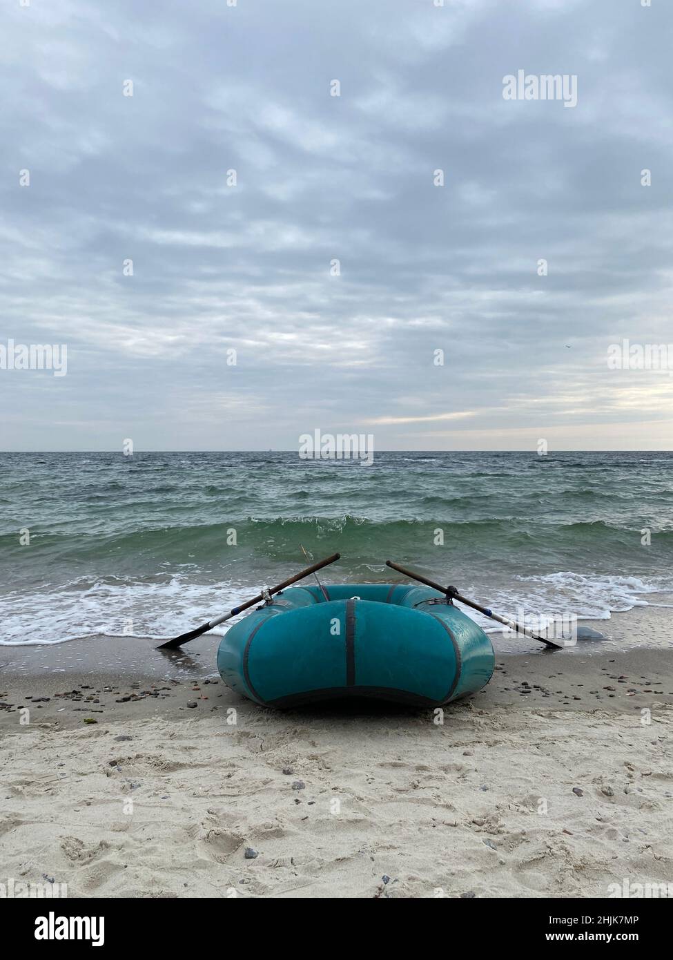 Vertical shot floating boat hi-res stock photography and images - Alamy