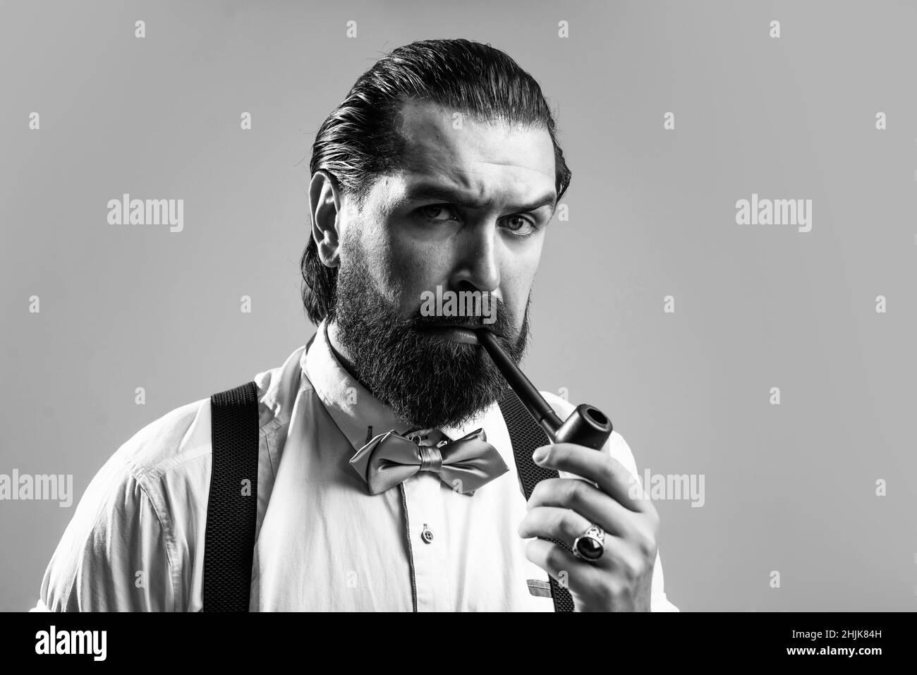 masculinity and charisma. formal male smokier. old fashioned bearded ...