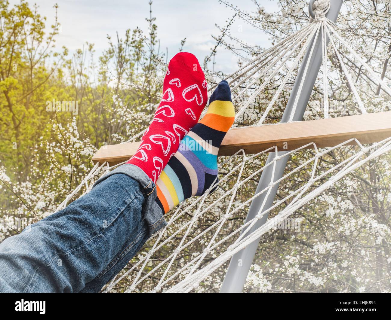 Men's legs and bright socks. Close-up, outdoor Stock Photo - Alamy
