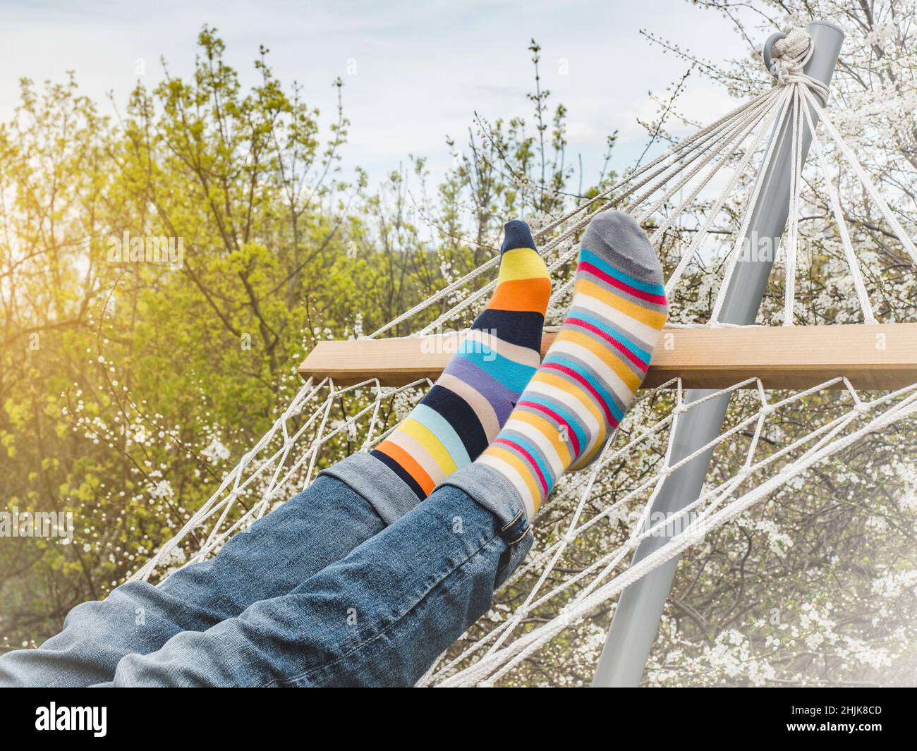 Men's legs and bright socks. Close-up, outdoor Stock Photo - Alamy