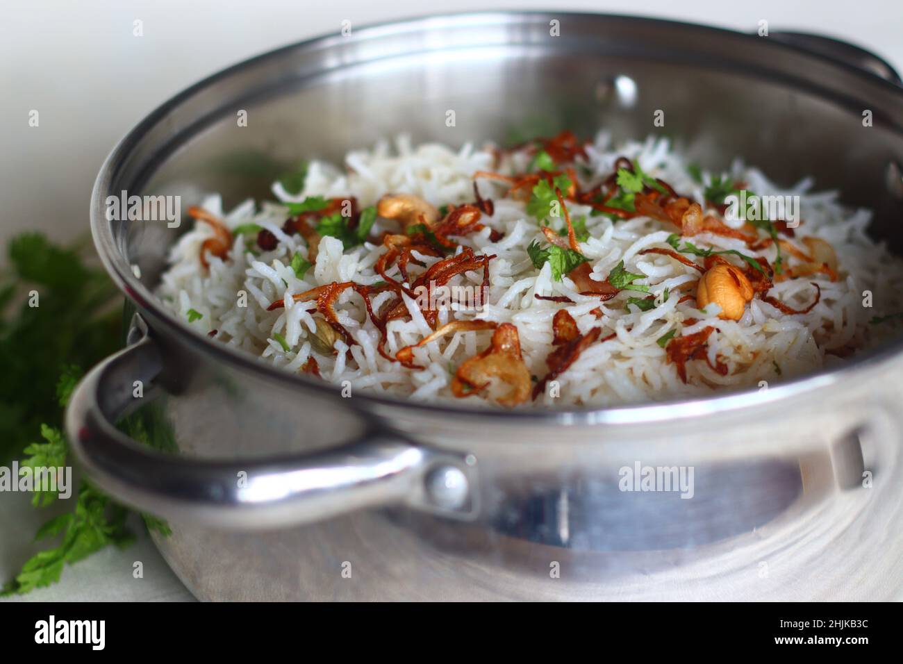 Cottage cheese Biryani or Paneer Biryani inside Biryani pot. Steamed ...