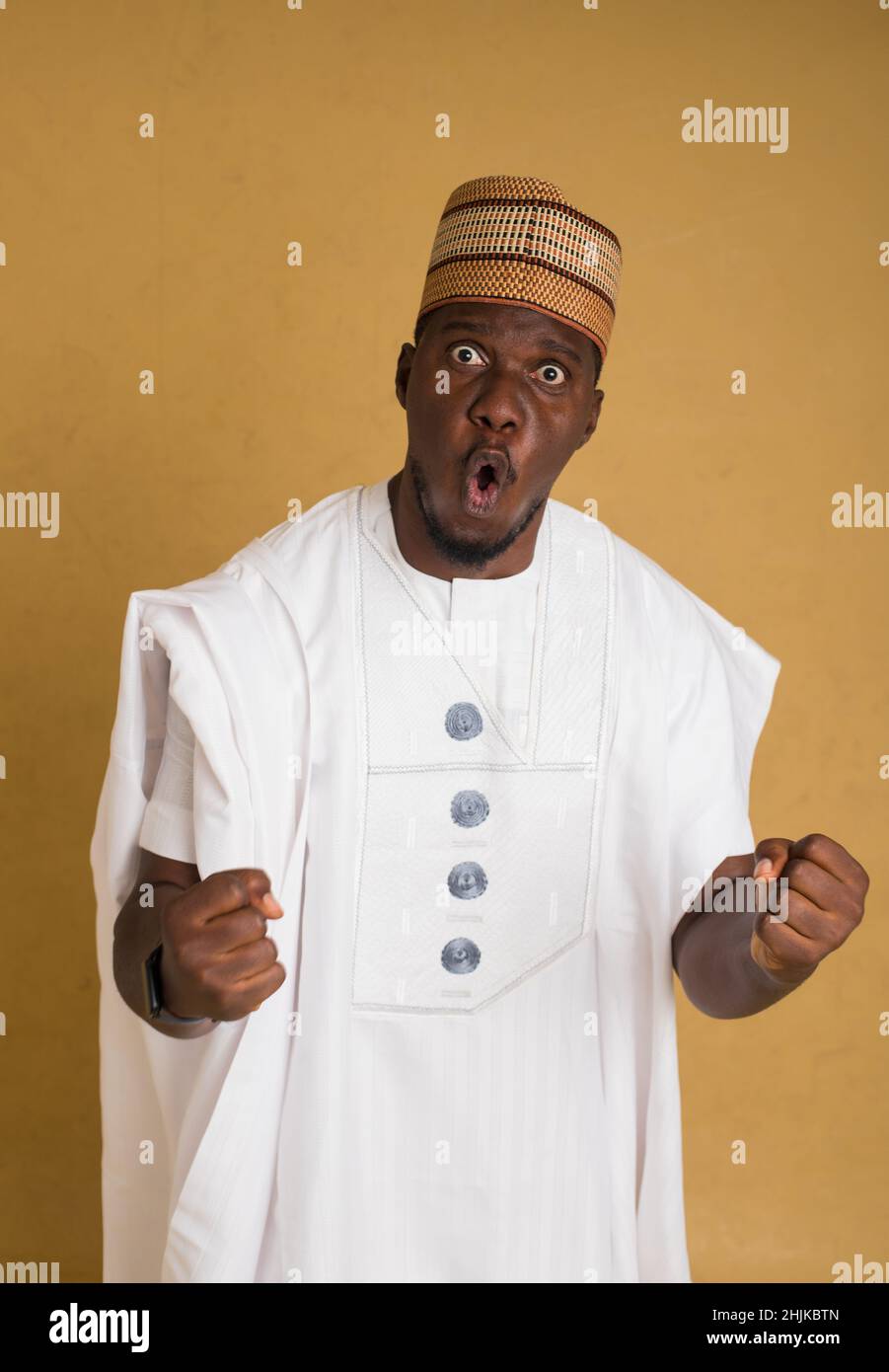 A Traditionally Dressed Northern Business Man Jubilant Stock Photo - Alamy