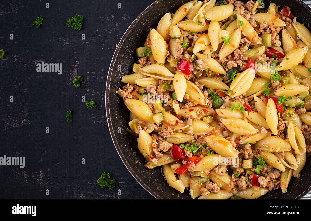 Conchiglie pasta. Italian pasta shells with minced meat, zucchini ...