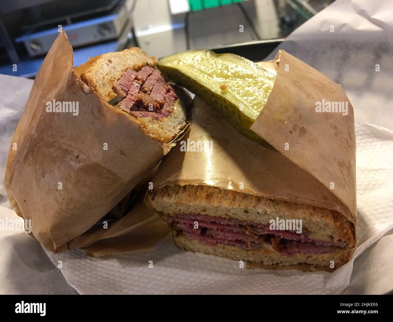 A fresh pastrami sandwhich with freshly pickeled cucumber Stock Photo ...