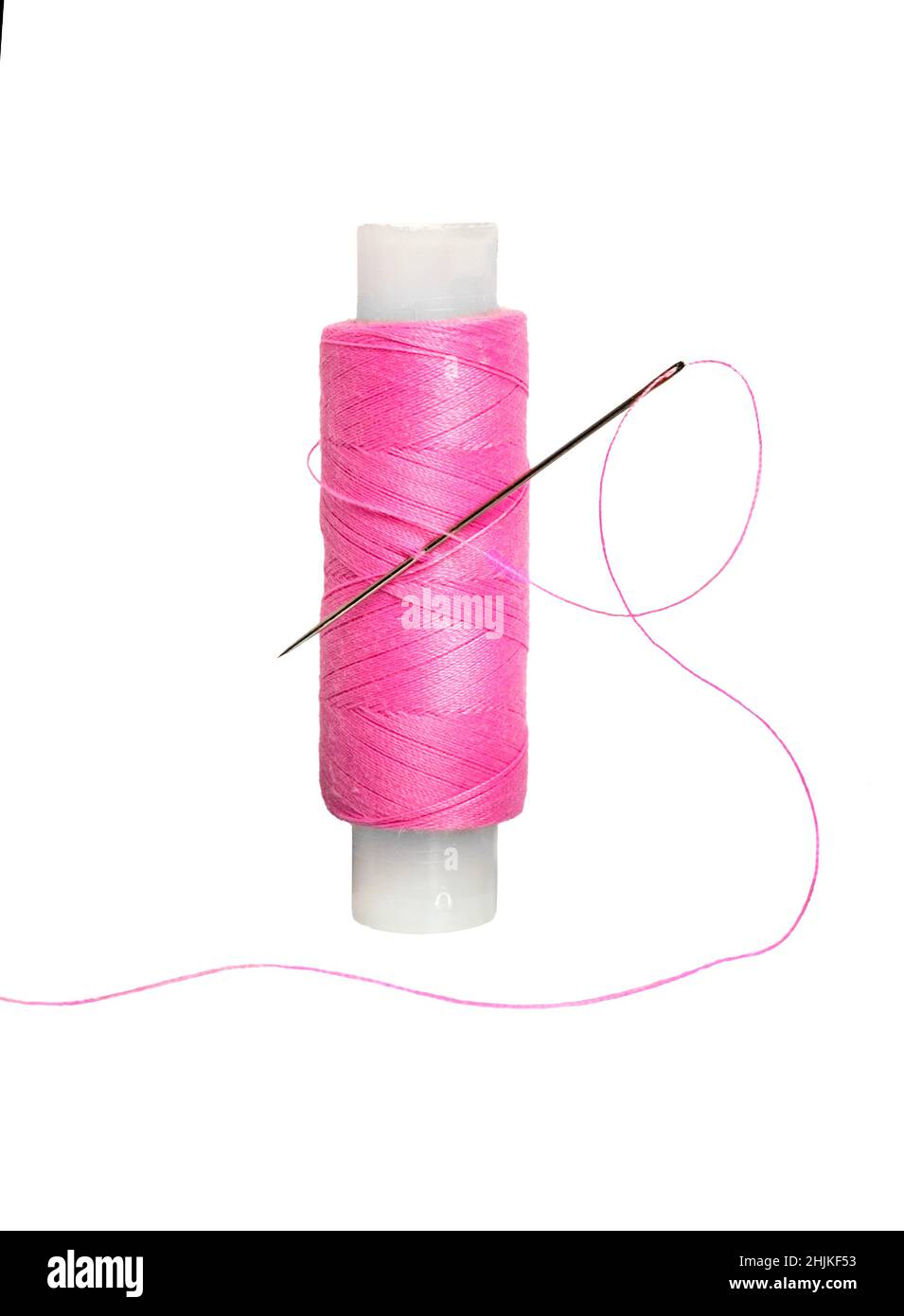 Sewing Needle and Thread Spool. Isolated on white background Stock ...