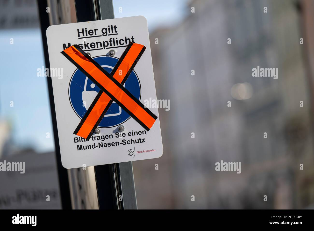 Rosenheim, Germany. 27th Jan, 2022. A crossed-out sign that reads ...