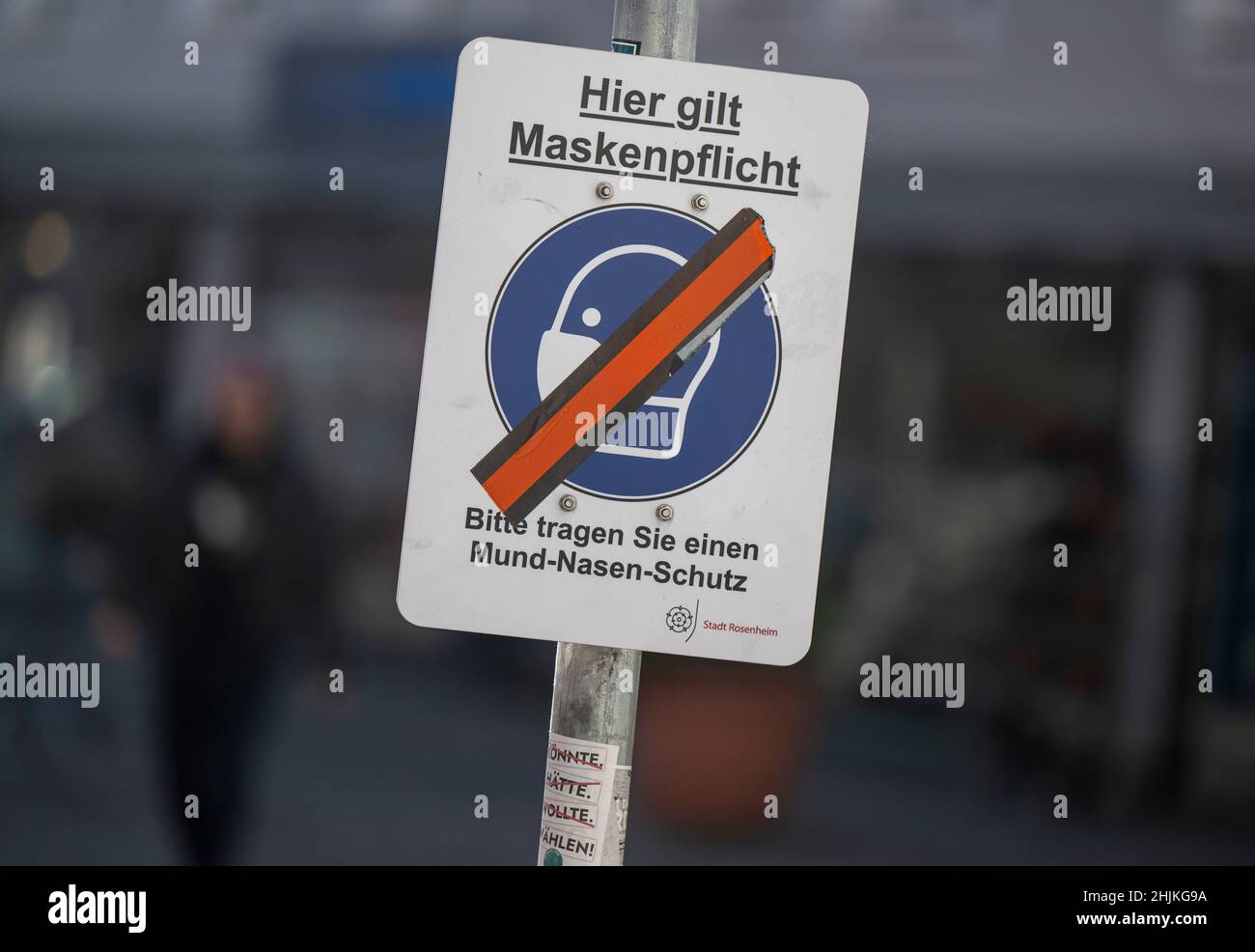 Rosenheim, Germany. 27th Jan, 2022. A crossed-out sign that reads ...