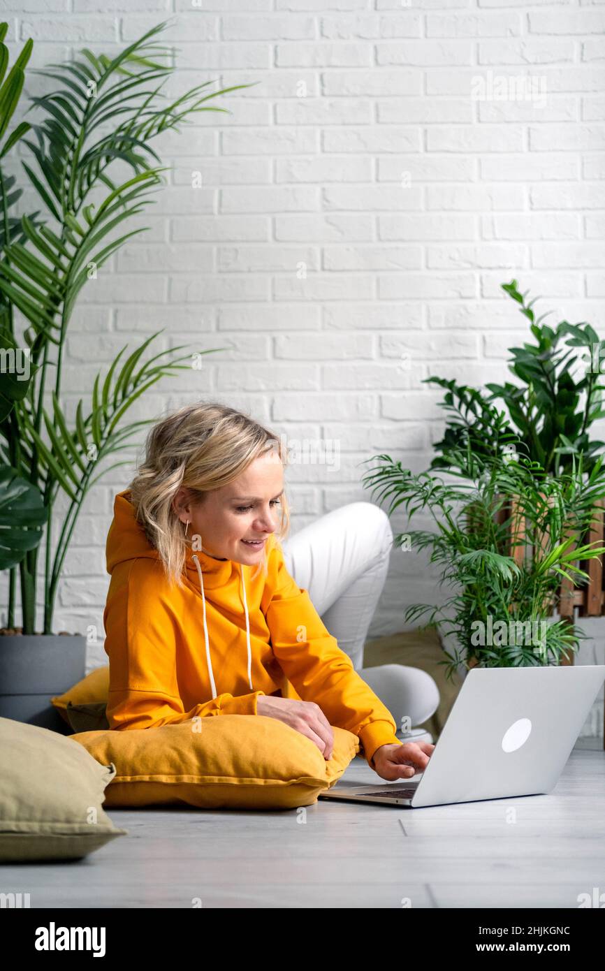 Woman girl using computer laptop working office work remotely from home ...