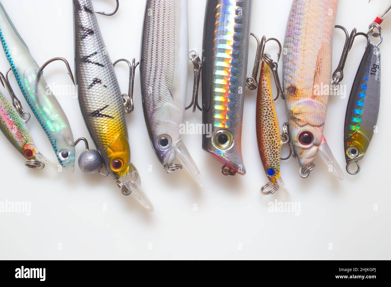 Fishing Lures with hooks on a white background Stock Photo - Alamy