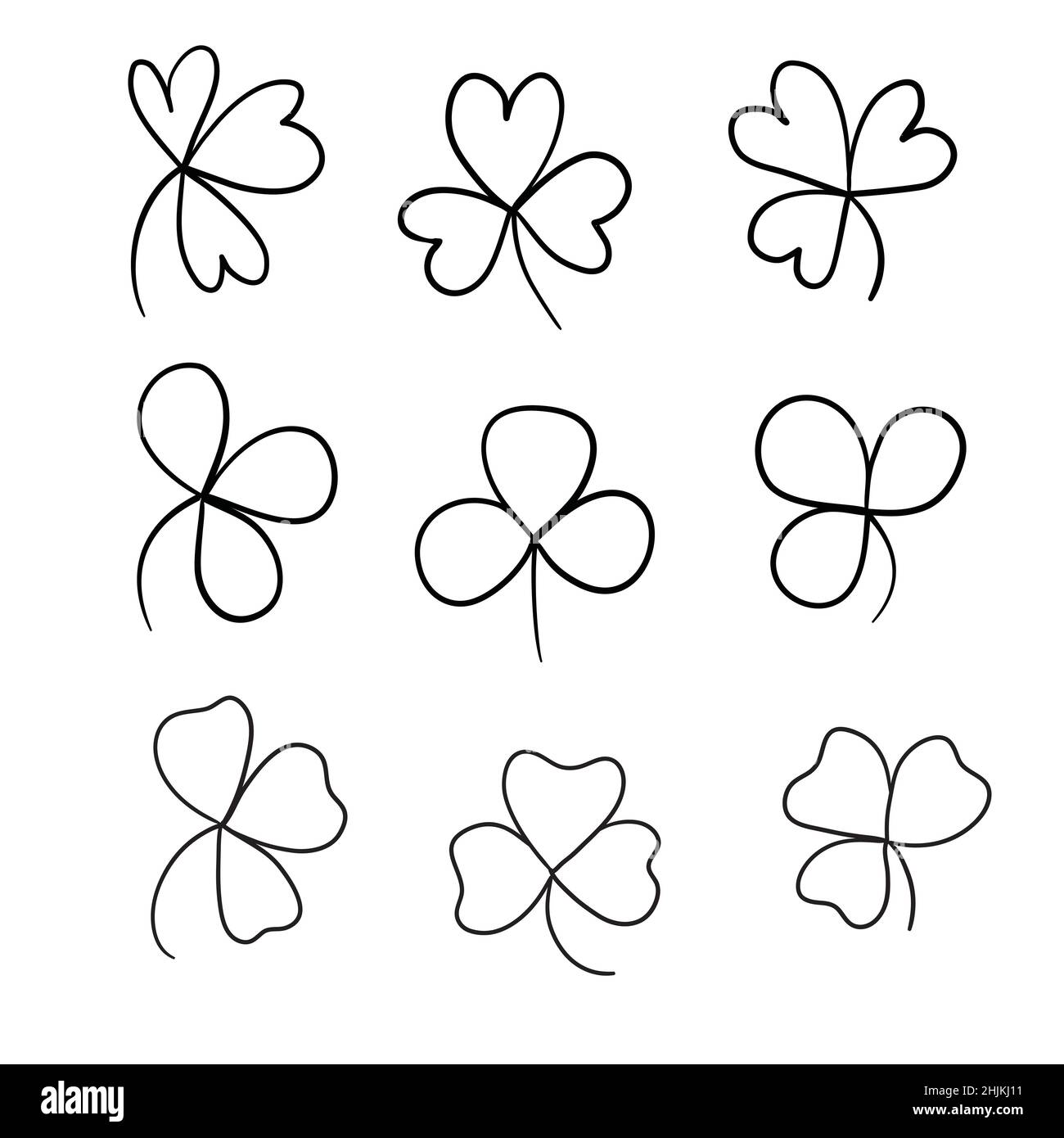 Vector illustration: Hand drawn brush shamrocks on white background ...