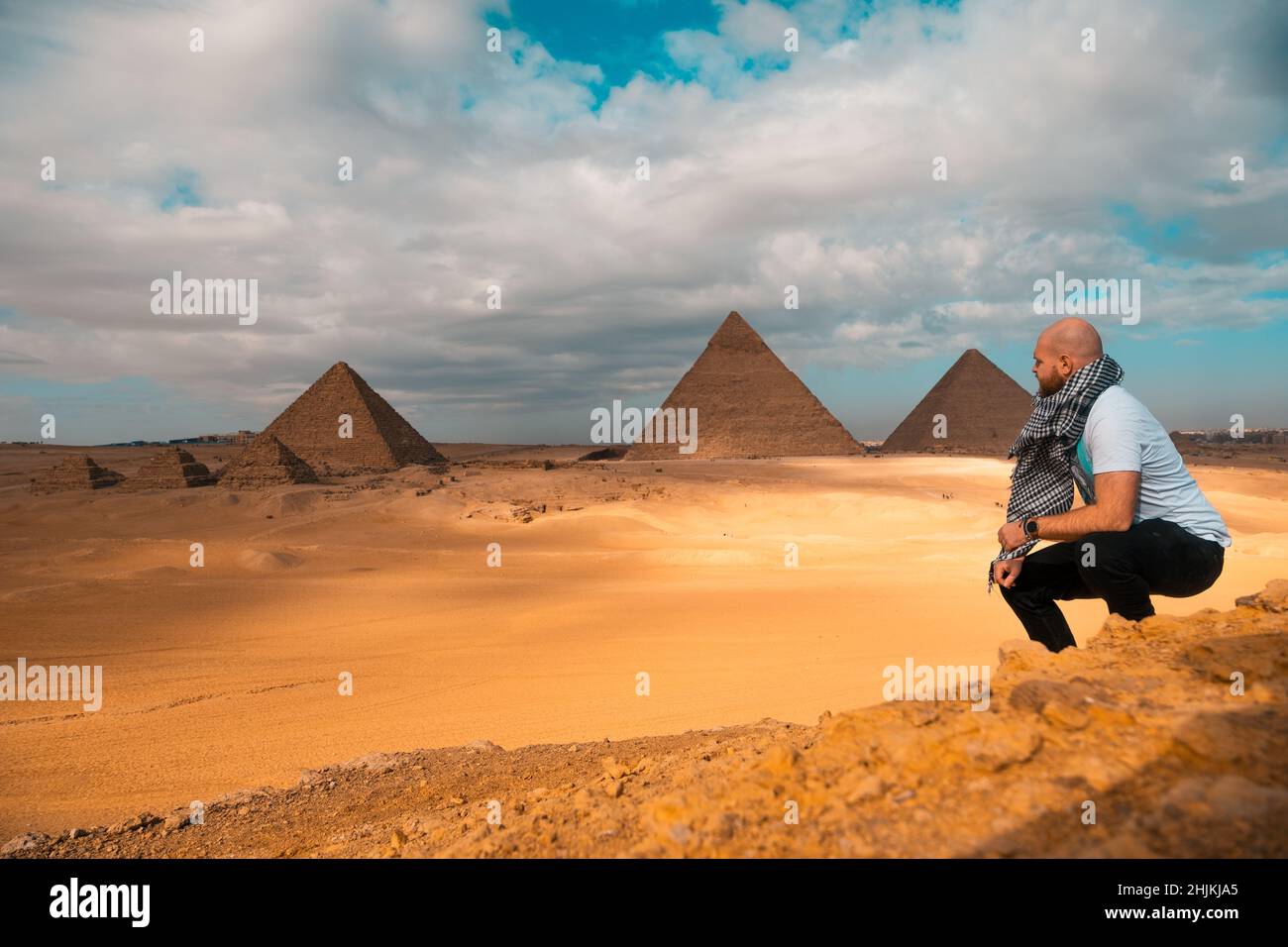 Man sitting on a pyramid hi-res stock photography and images - Alamy