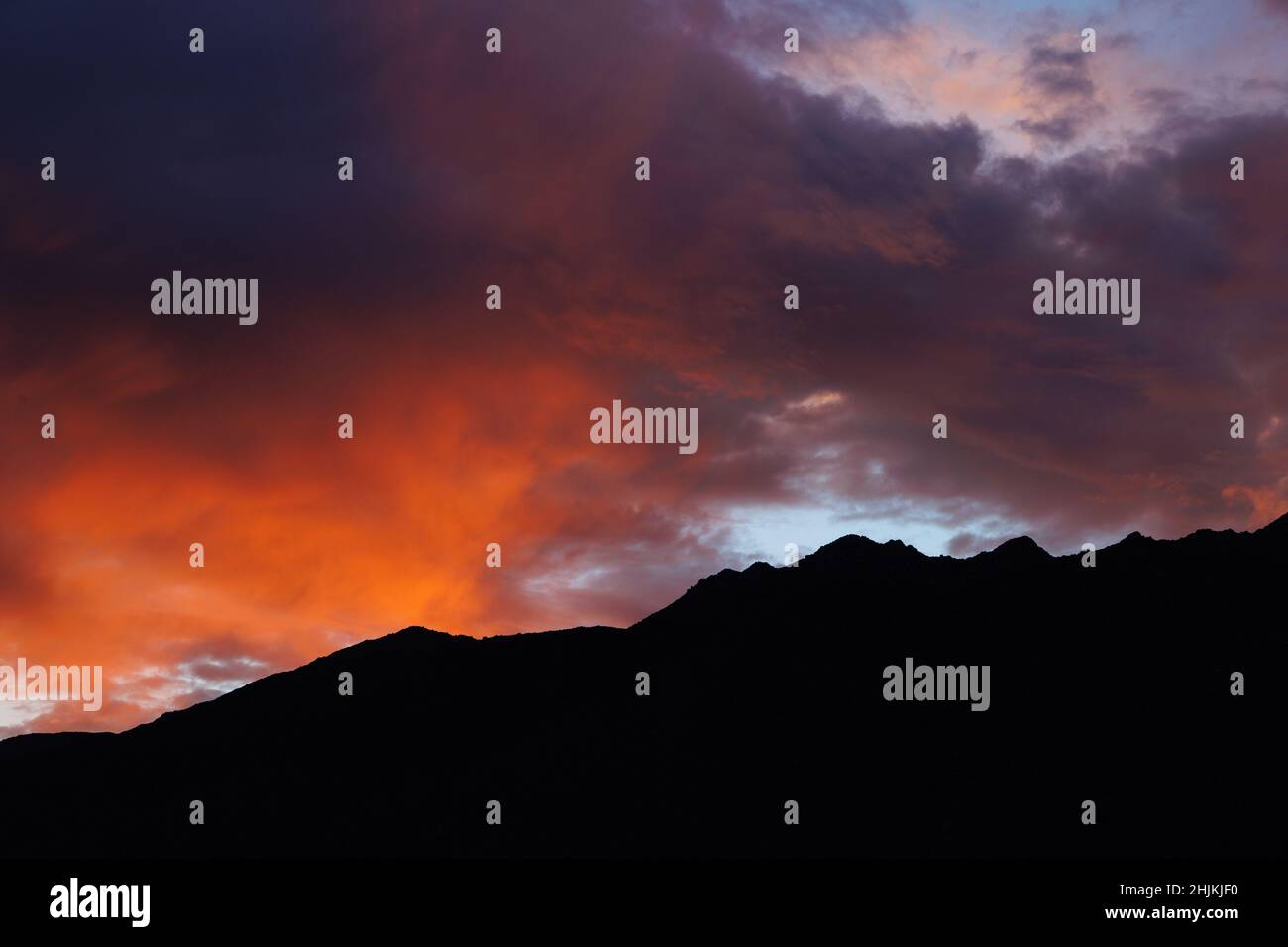 Red clouds at sunset over the Santa Rosa mountain range in Anza Borrego ...