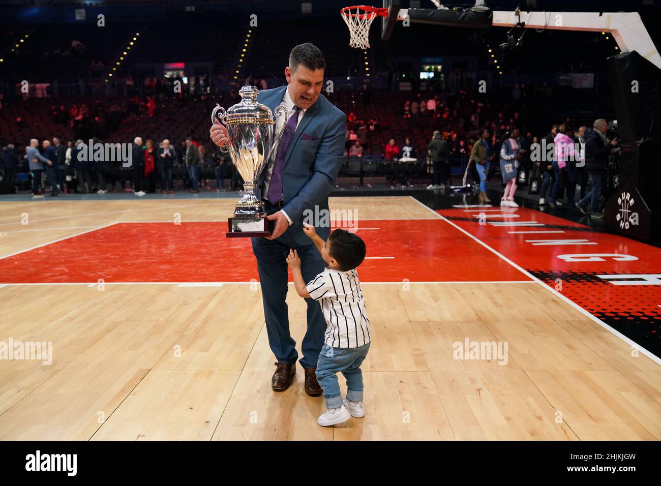 Leicester Riders head coach Rob Paternostro with the trophy after his ...