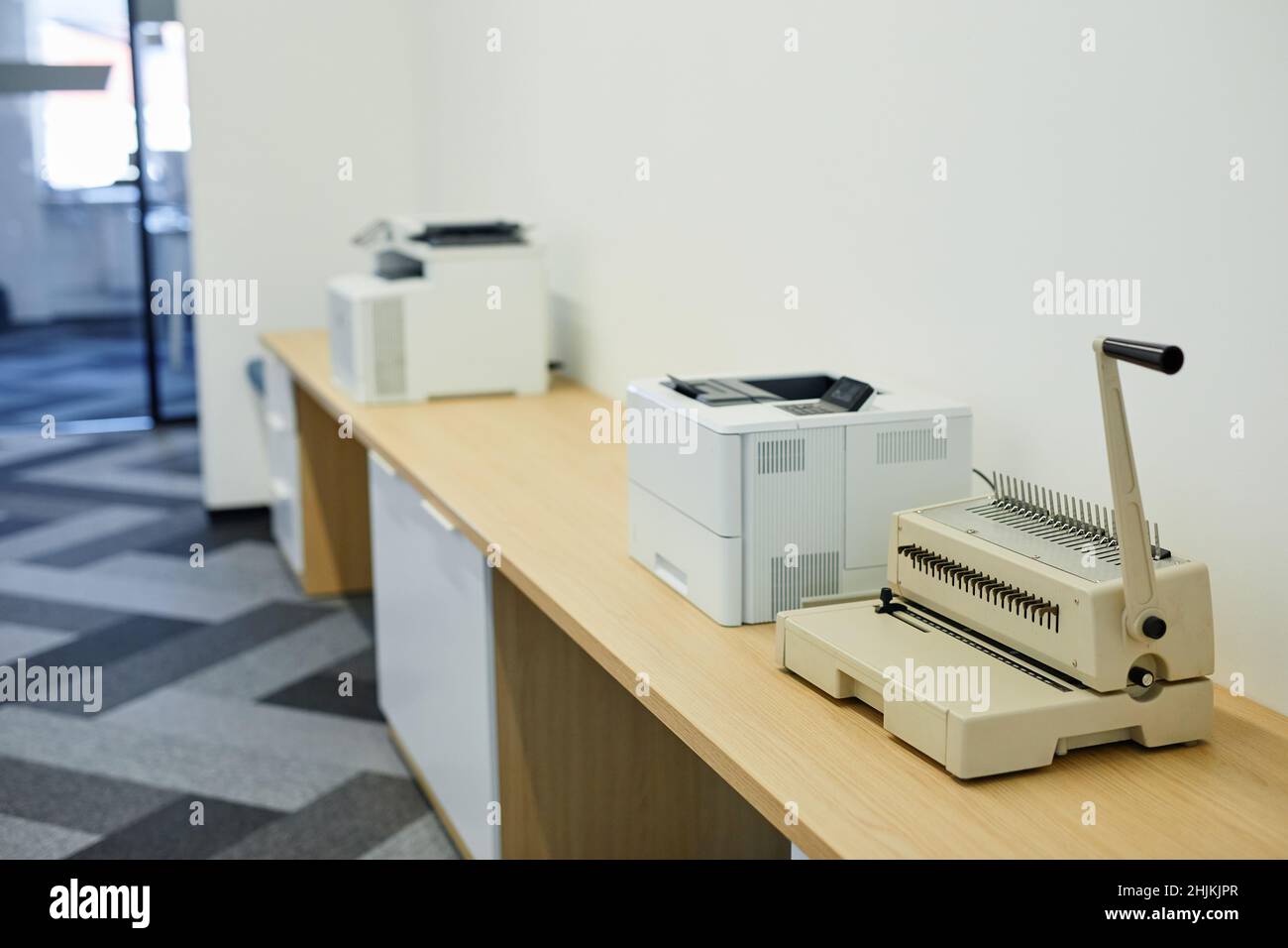 Background image of copying machines and printers set in office ...