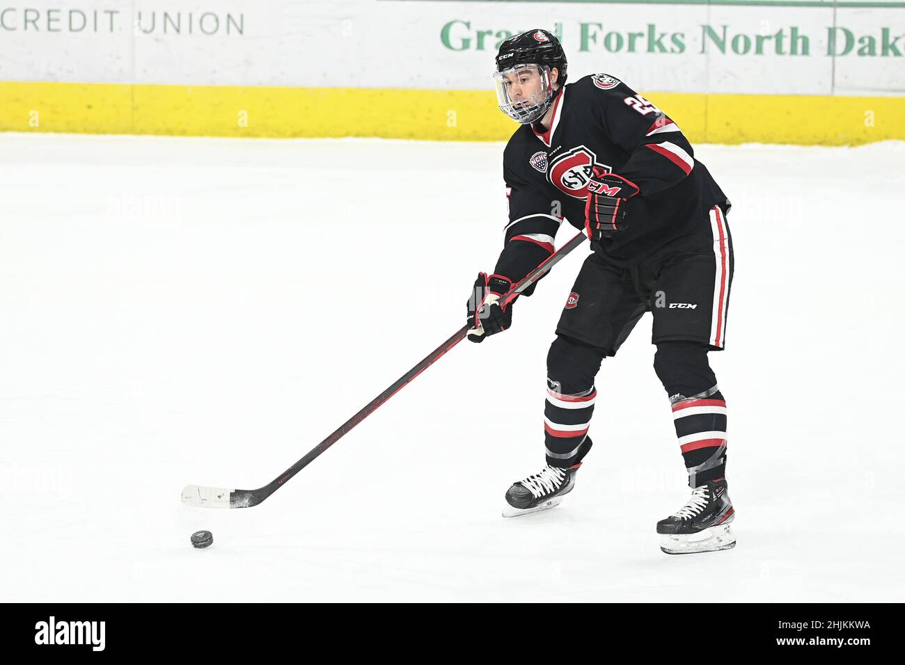 St. Cloud State Huskies defenseman Nick Perbix (25) passes the puck ...