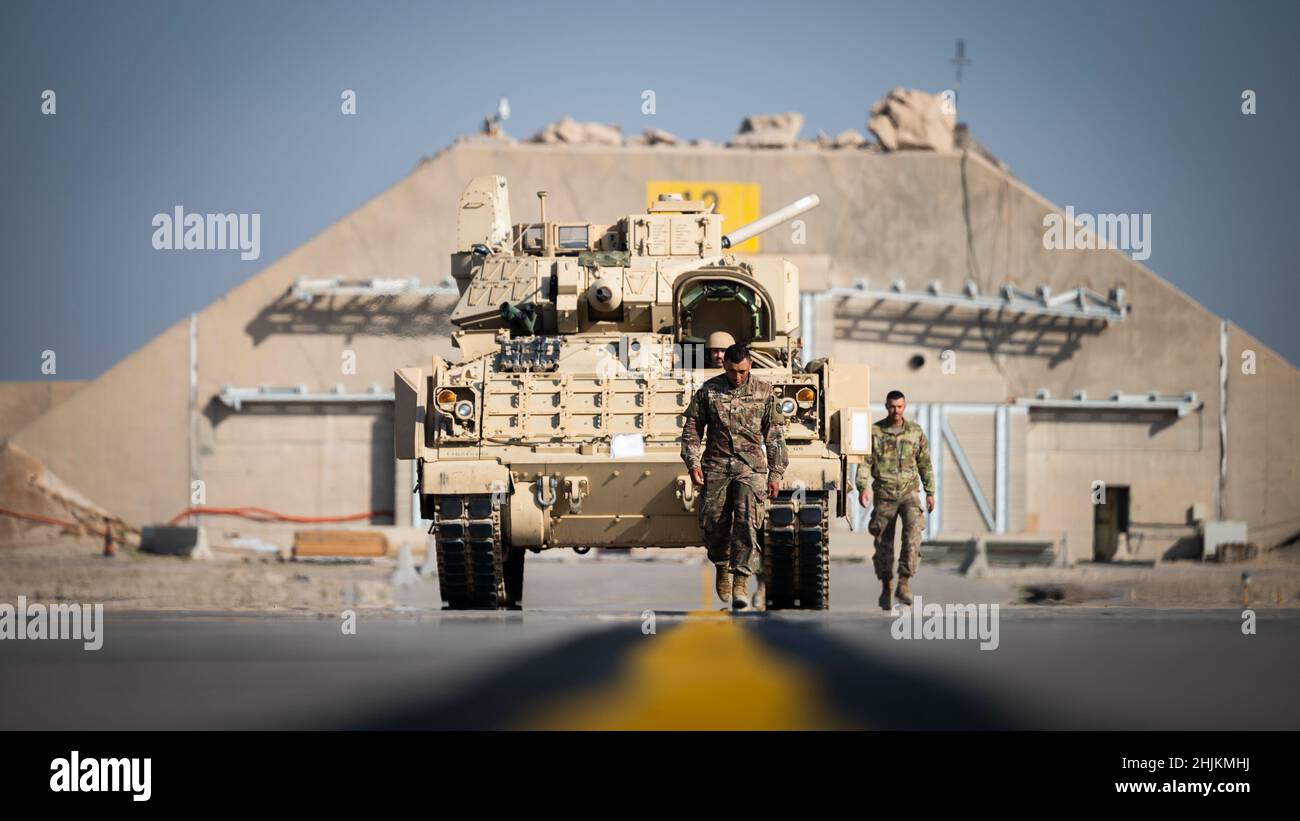 U.S. Army Soldiers guide a retrofitted M2A3 Bradley Fighting Vehicle to ...