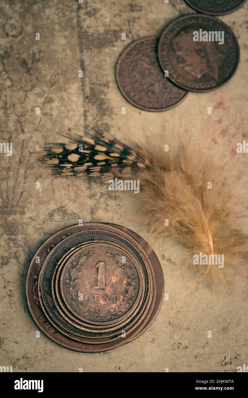 Old One Cent Coin on a stack of vintage world coins Stock Photo - Alamy