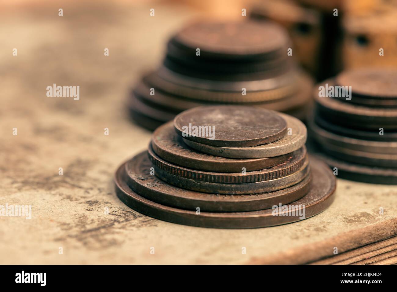 Stacks of old world coins Stock Photo - Alamy