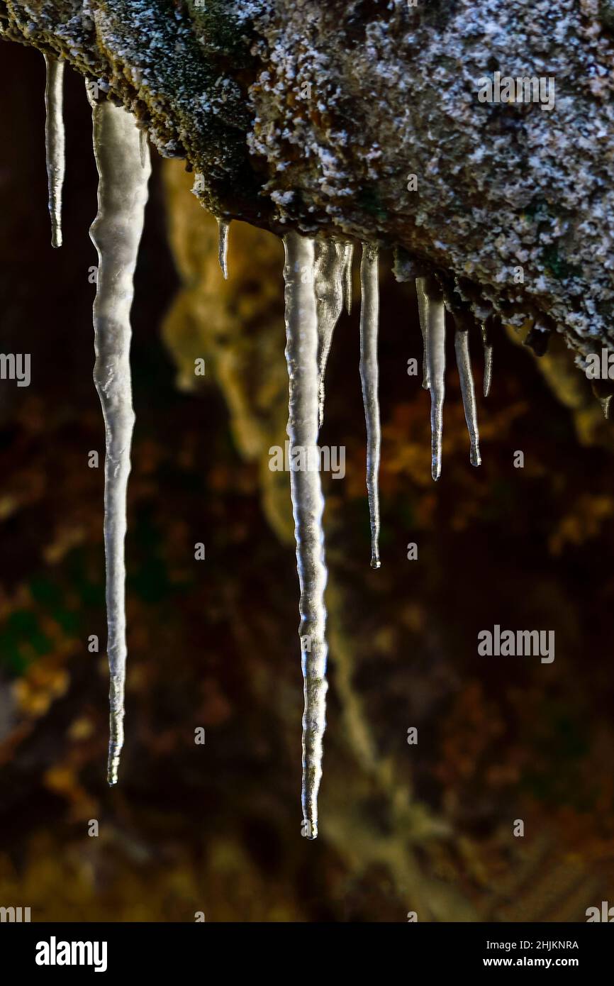 Water dripping from an object is frozen by frost Stock Photo - Alamy