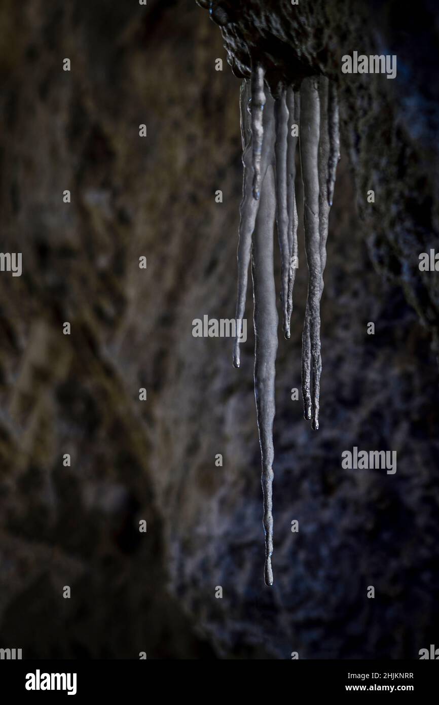 Water dripping from an object is frozen by frost Stock Photo - Alamy