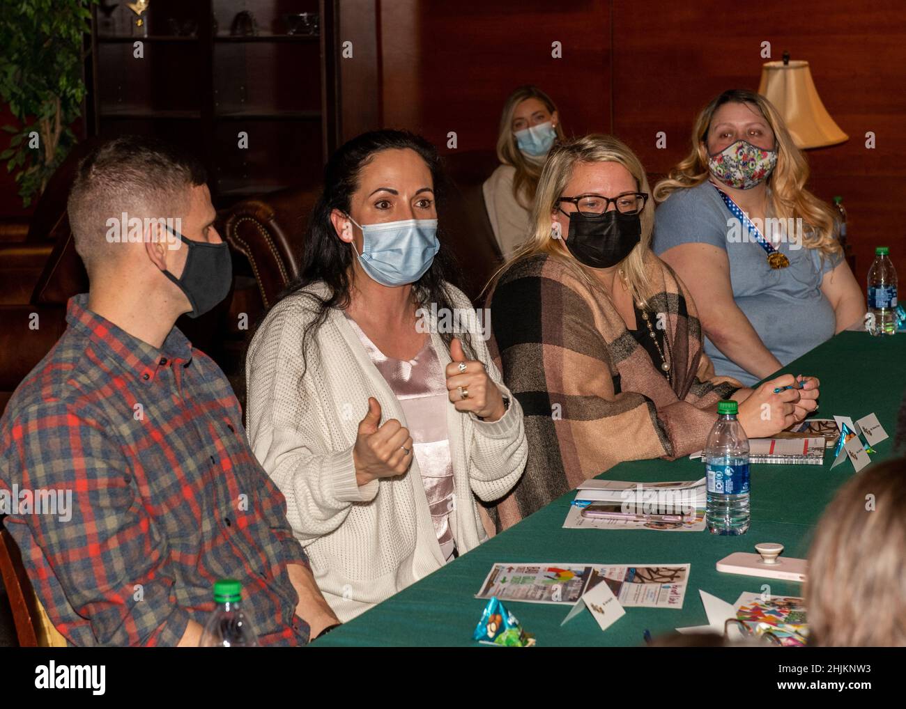 Dr. Doniel Wolfe, second from left, spouse of the Pacific Air Forces ...