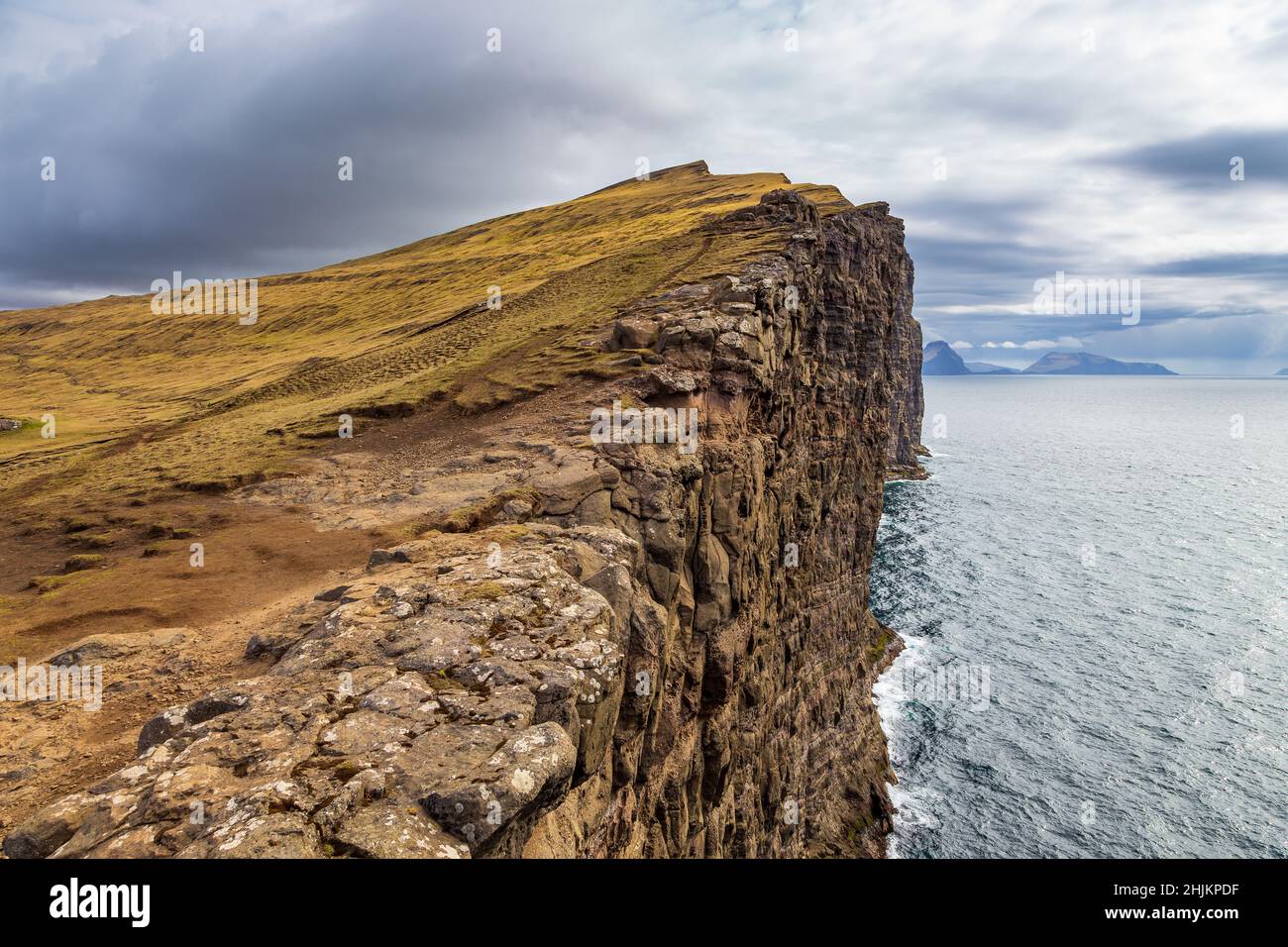 View of the Slave Cliff and Leitisvatn Lake on Vagar Island. Beautiful ...
