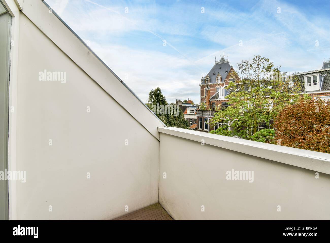 Balcony of a beautiful house in the daytime Stock Photo - Alamy