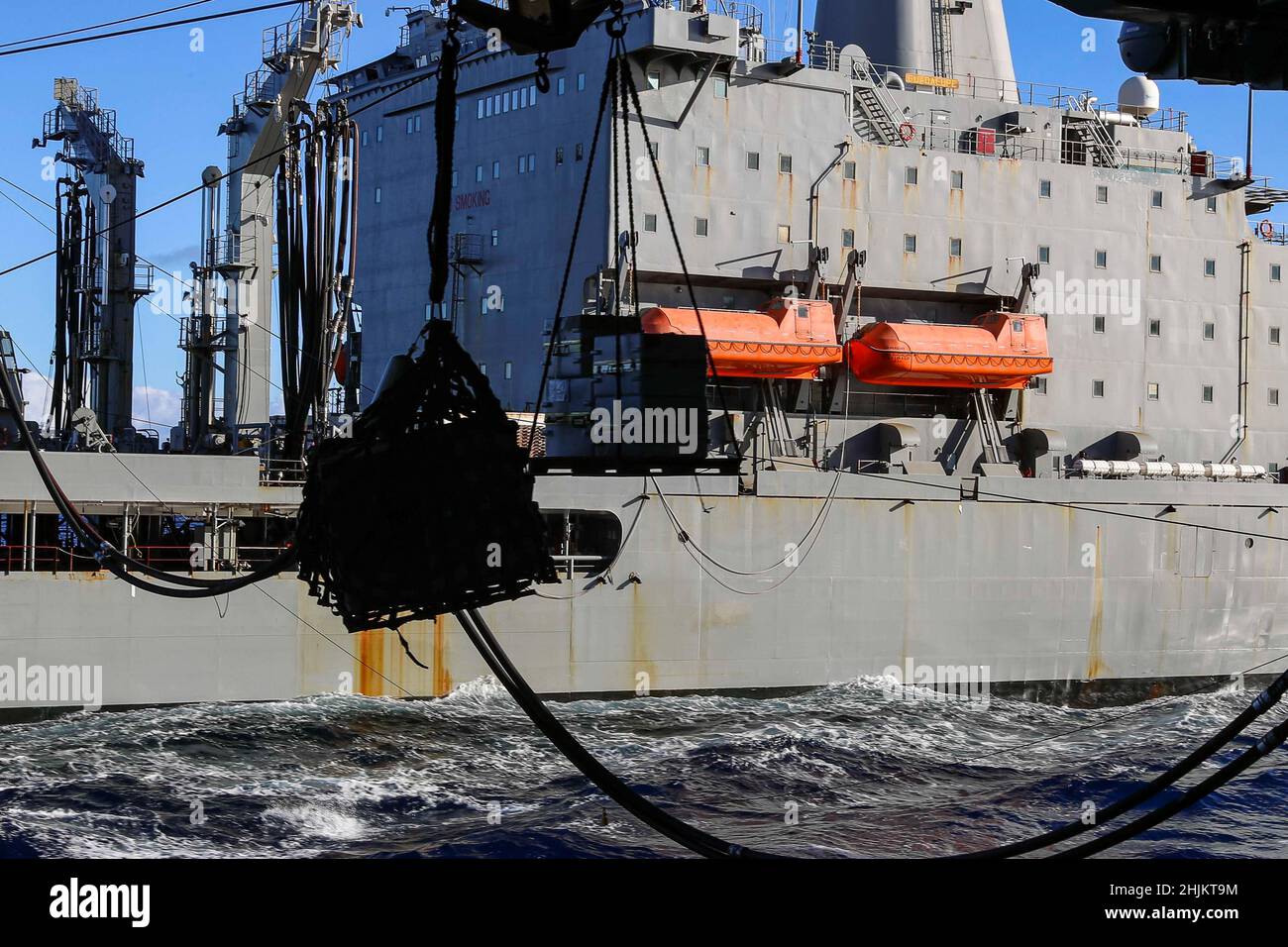 PACIFIC OCEAN (Jan. 15, 2022) Cargo is transported from USS Abraham ...