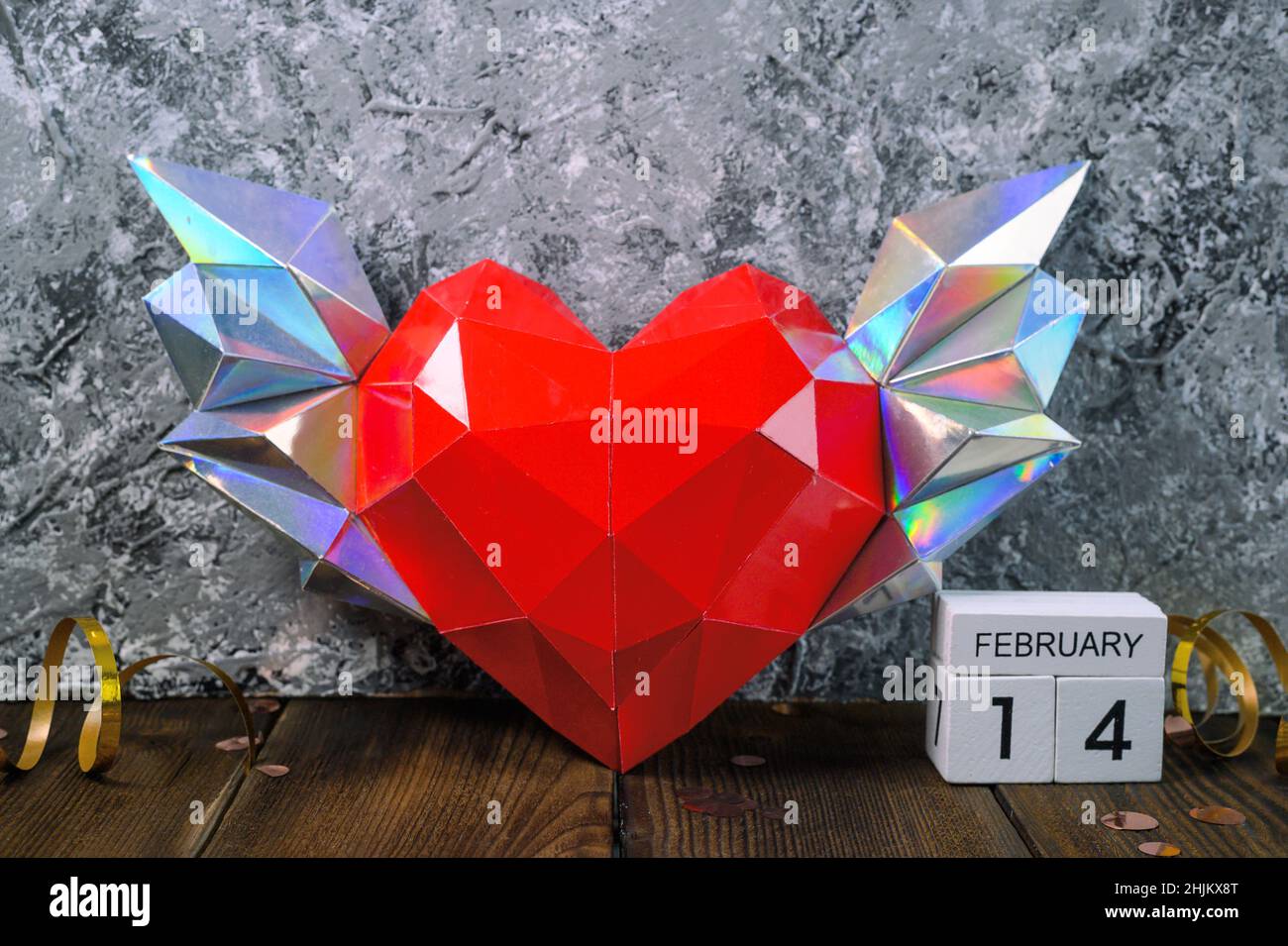 Valentine's day calendar. and a red heart Stock Photo - Alamy