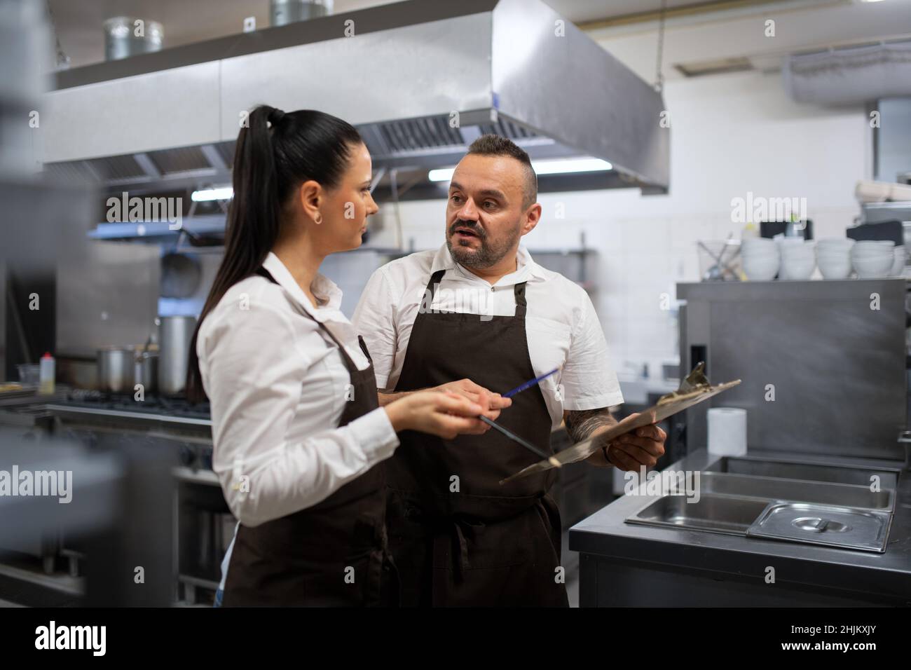 Menu restaurant man kitchen chef hi-res stock photography and images ...