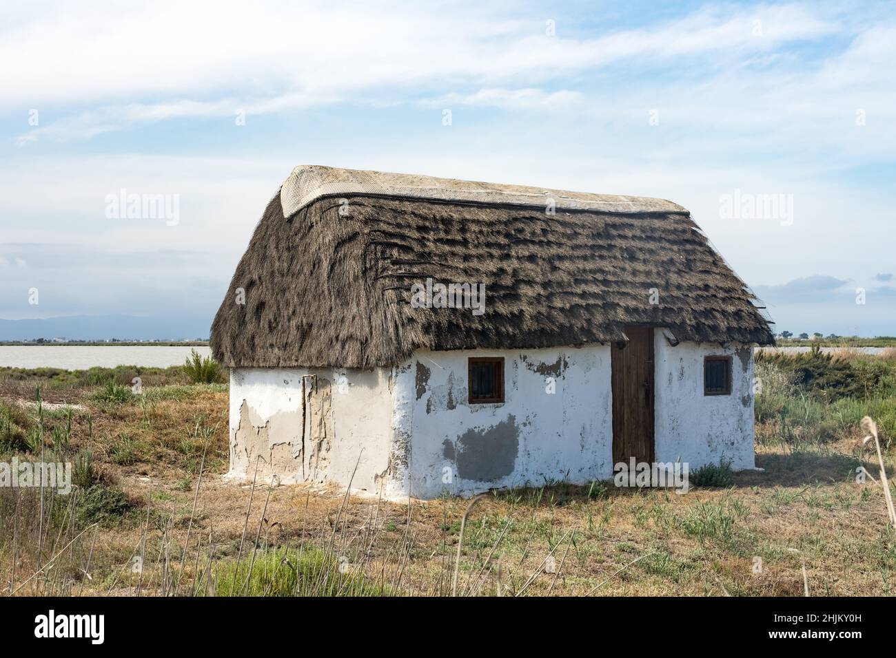 Old fishers typical house (barraca) of Delta del Ebro Stock Photo - Alamy