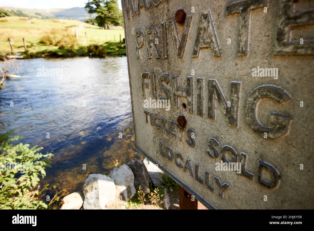 private fishing sign on river rathay flowing between rydal and ...