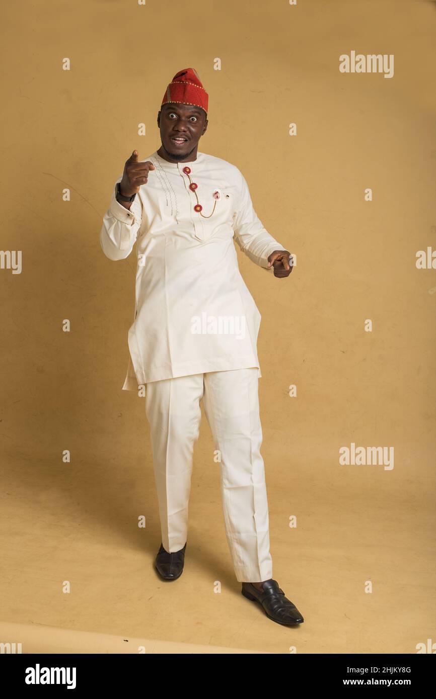 Yoruba Culturally Dressed Business Man leaning backwards in shock and ...