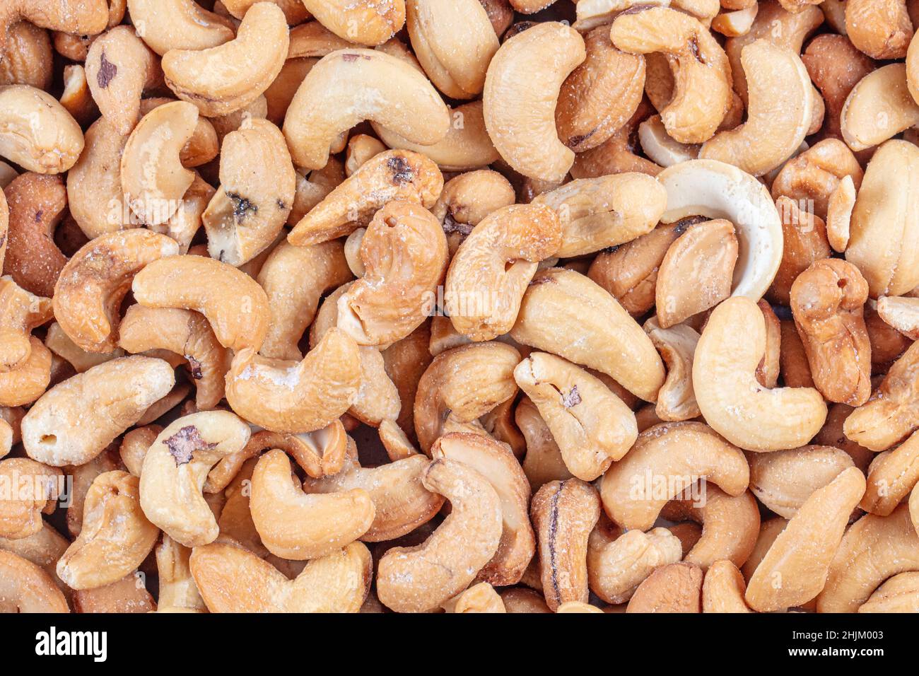 Cashews are made into food. Close up of shelled cashews. Roasted ...