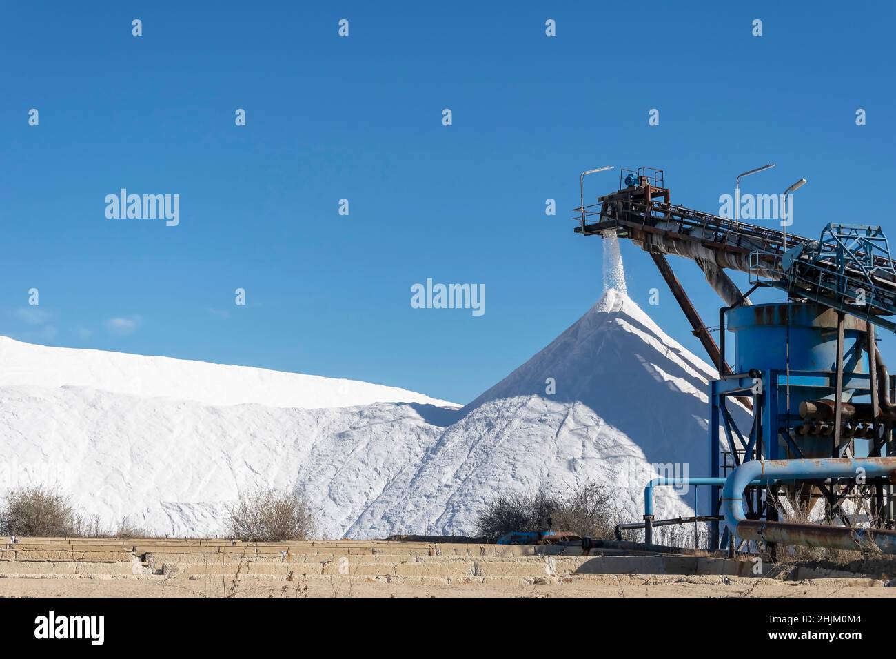 Sea salt production and storage Stock Photo - Alamy