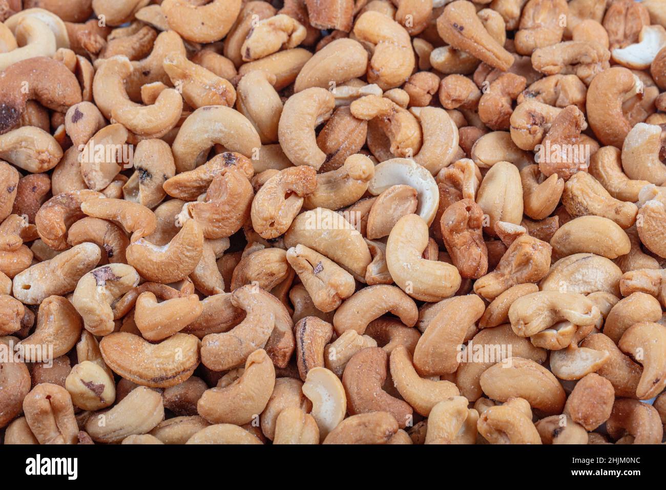 Cashews are made into food. Close up of shelled cashews. Roasted ...