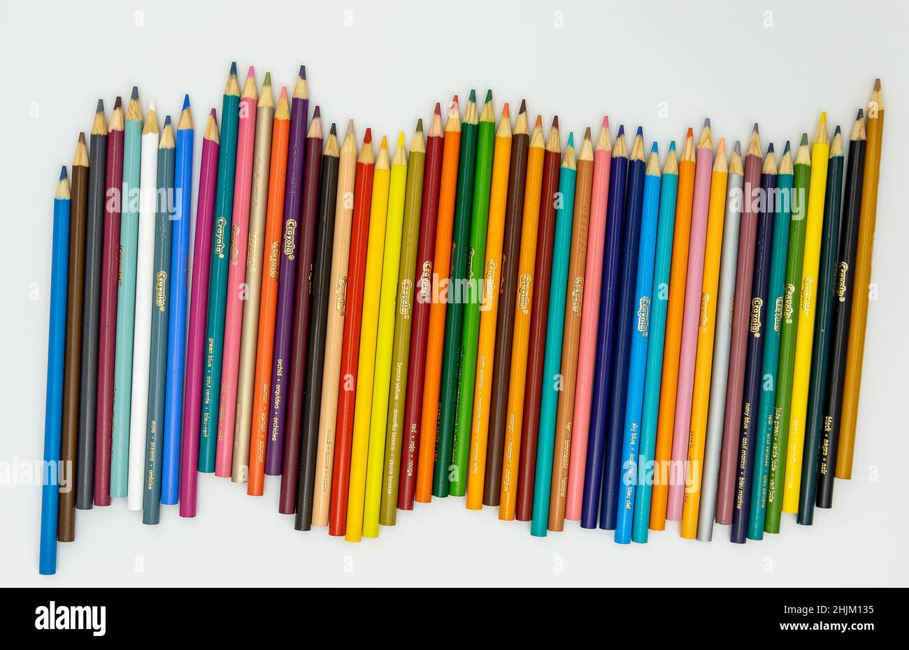 Colored wooden sharp pencils on a white background Stock Photo - Alamy