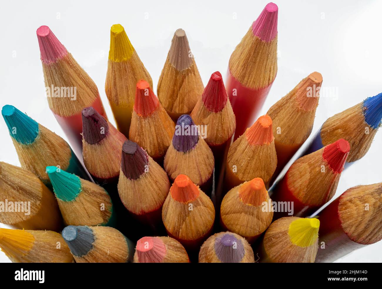 Colored wooden sharp pencils on a white background Stock Photo - Alamy
