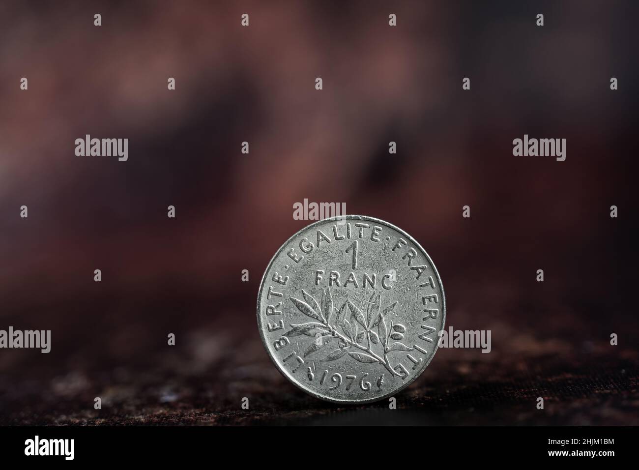 Isolated one Franc coin on a dark background. ancient french currency ...