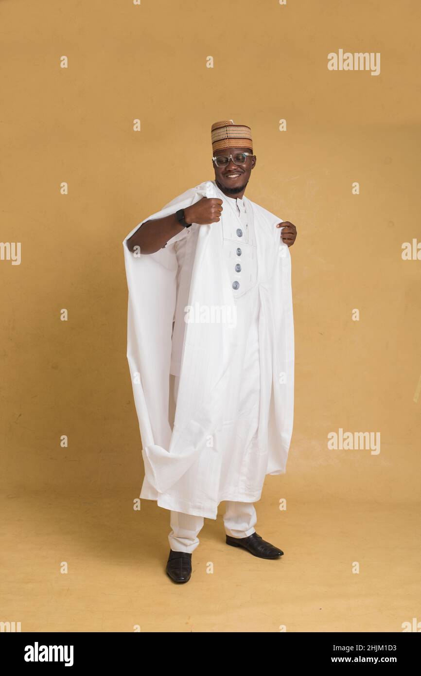 A Traditionally Dressed Northern Business Man Dancing and Posing Stock ...