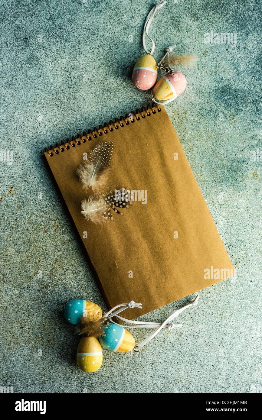 Easter card concept with craft paper notepad on concrete table Stock ...